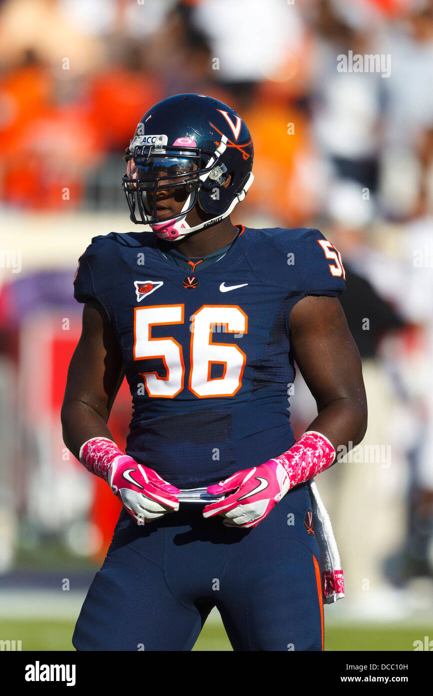 Virginia Cavaliers defensive end Cam Johnson (56) lines up for a play ...