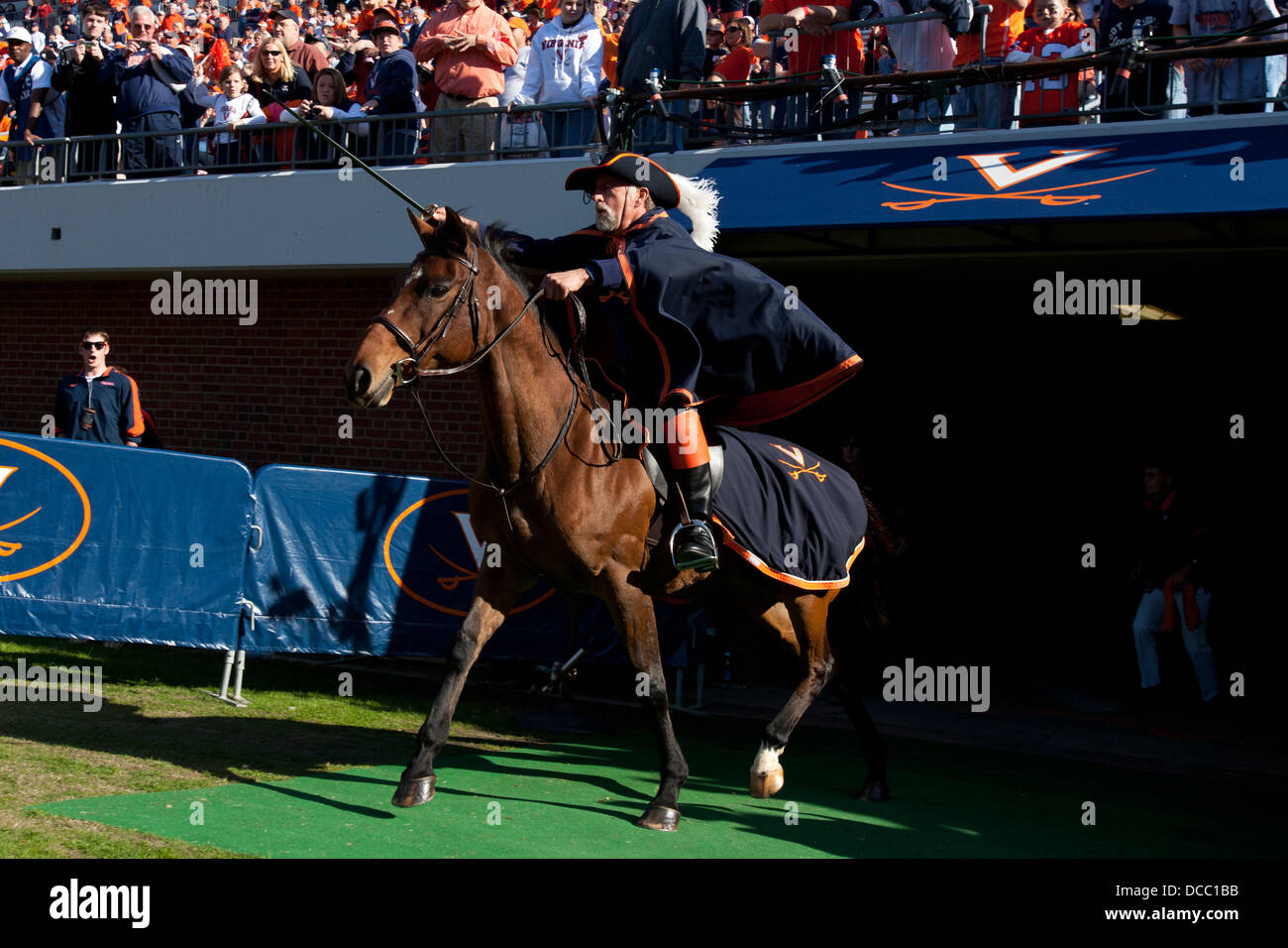 The Virginia Cavaliers mascot enters the field on horseback before the ...