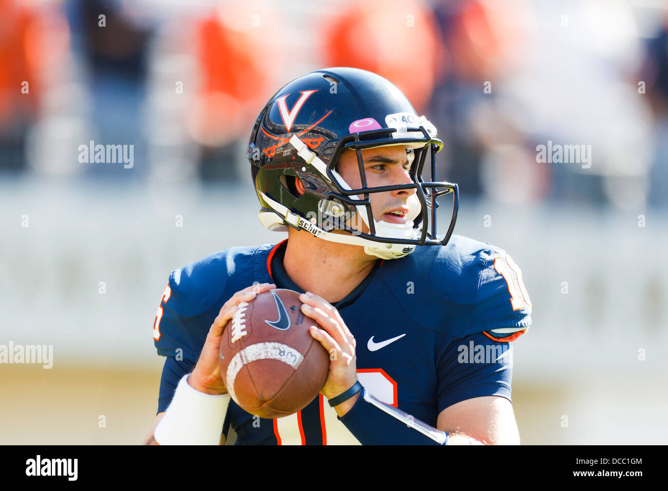 Virginia Cavaliers quarterback Michael Rocco (16) warms up before the ...
