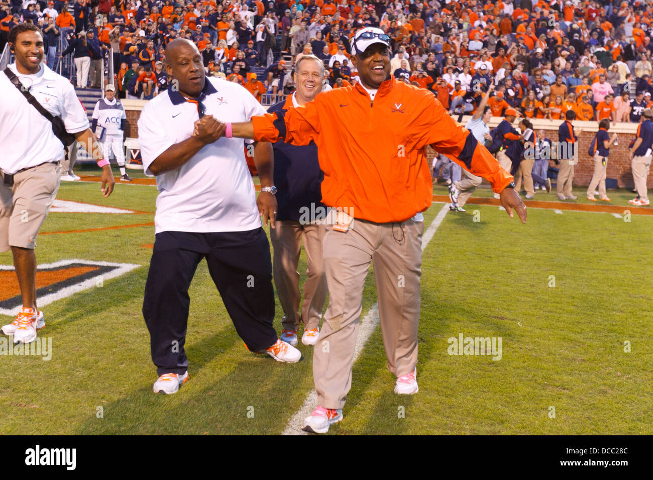 Virginia Cavaliers head coach Mike London celebrates on the field after ...