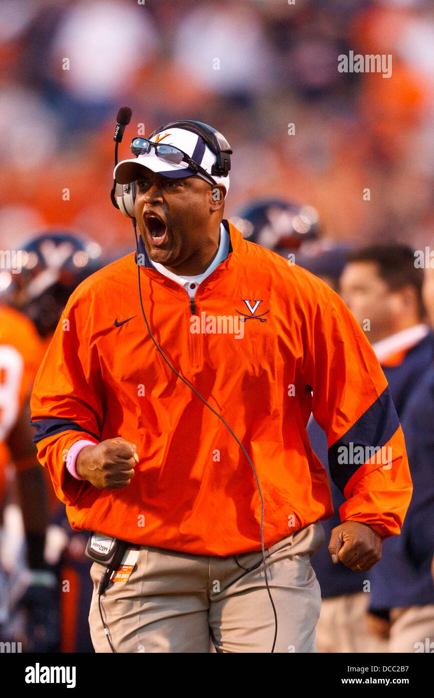 Virginia Cavaliers head coach Mike London celebrates on the sidelines ...