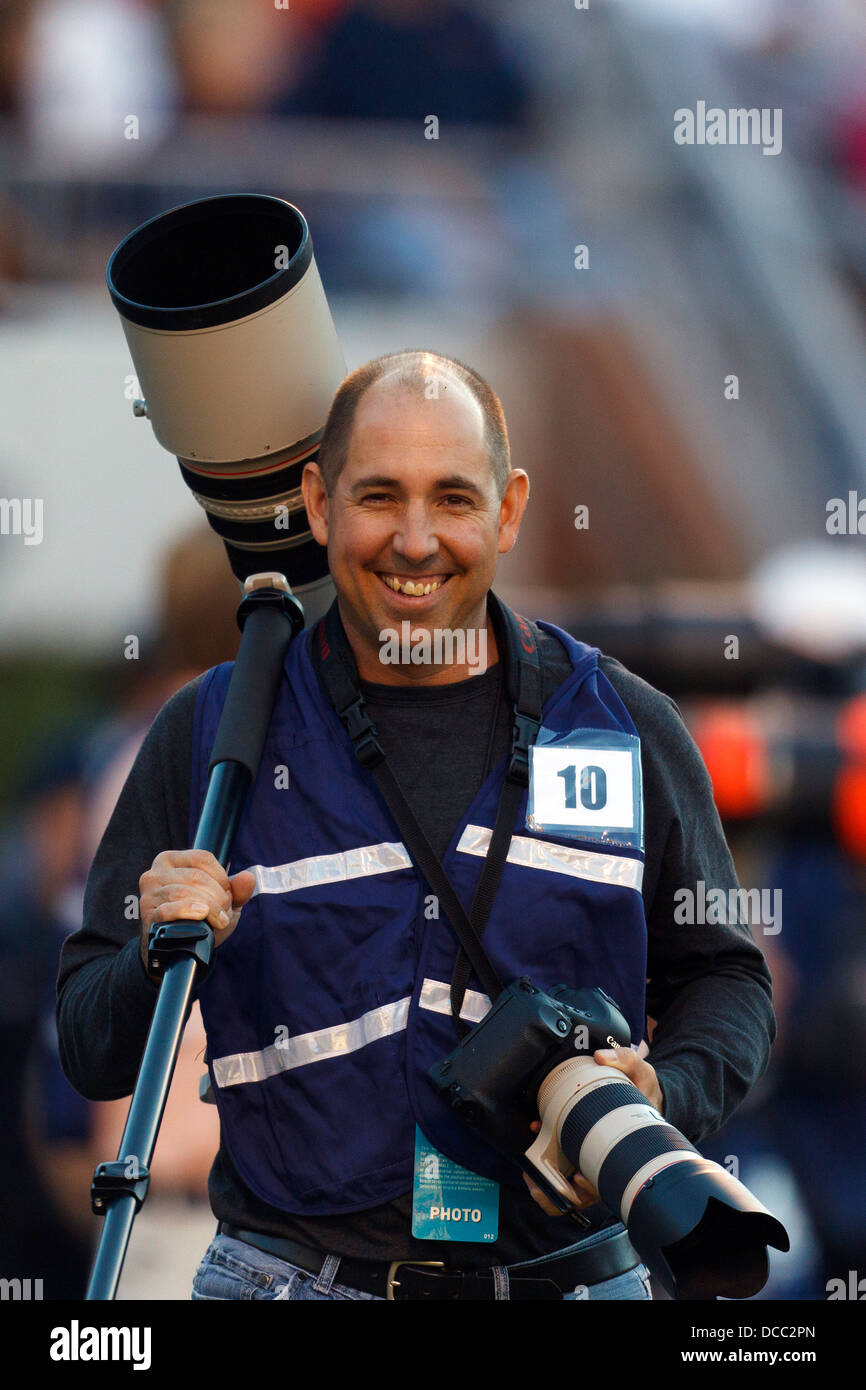 Newspaper photographer Andrew Shurtleff during a football game Stock ...