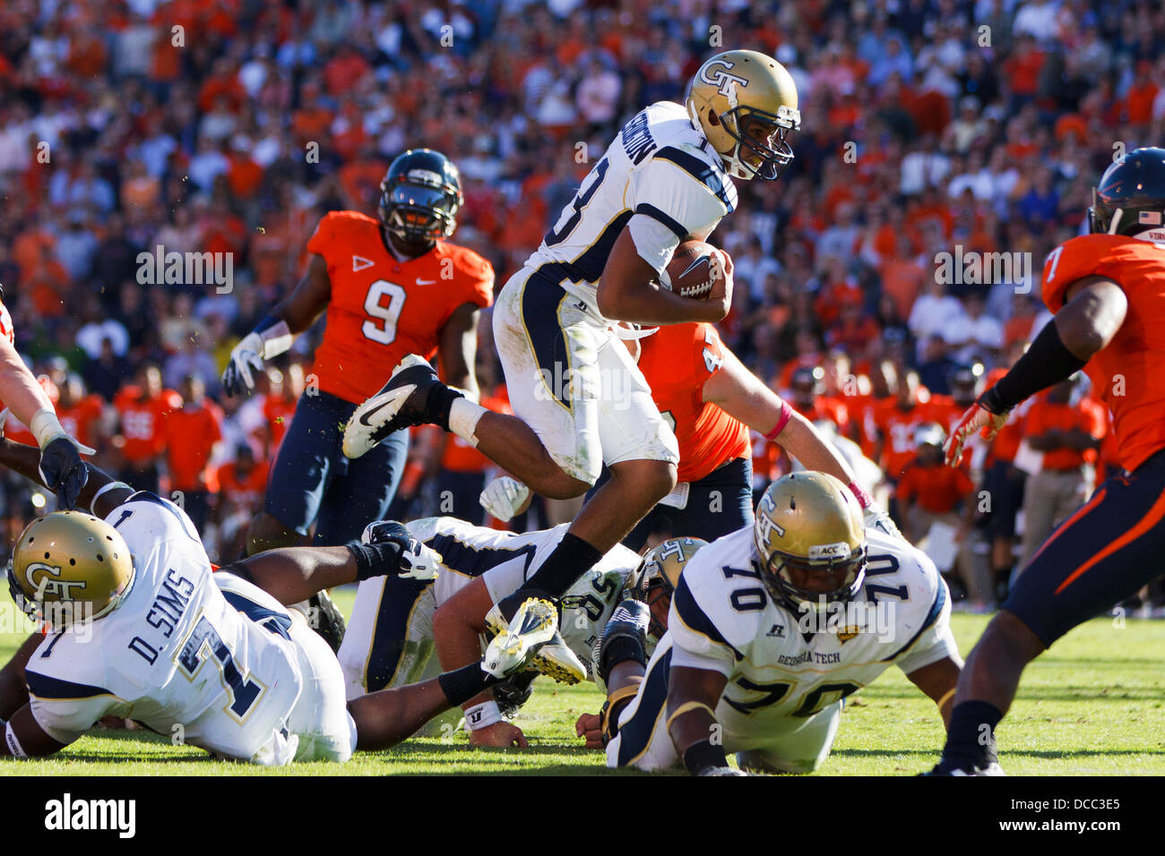 Georgia Tech Yellow Jackets quarterback Tevin Washington (13) leaps ...