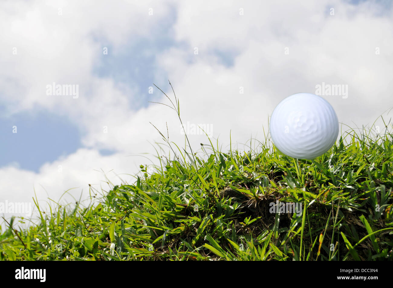 Flying golf ball Stock Photo - Alamy