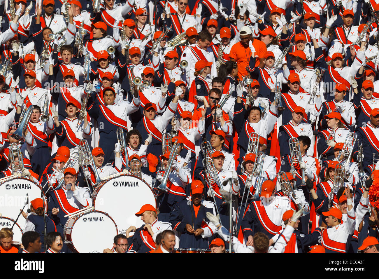 The Virginia Cavaliers band celebrates in the stands after a touchdown ...