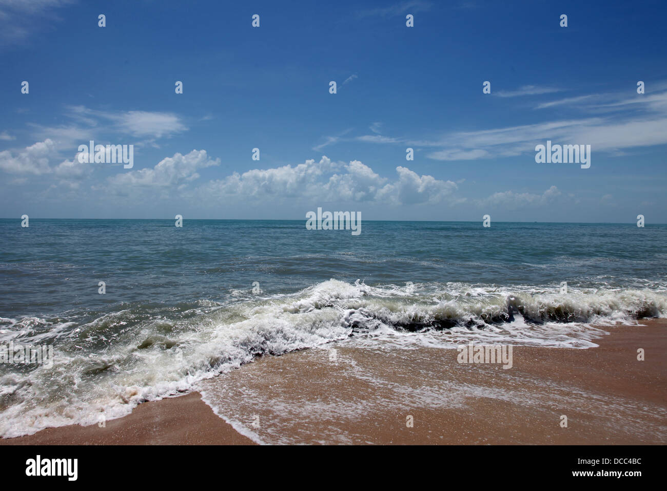 It's a photo of a beach in Malaysia. We can see a nice deep blue sea or ...