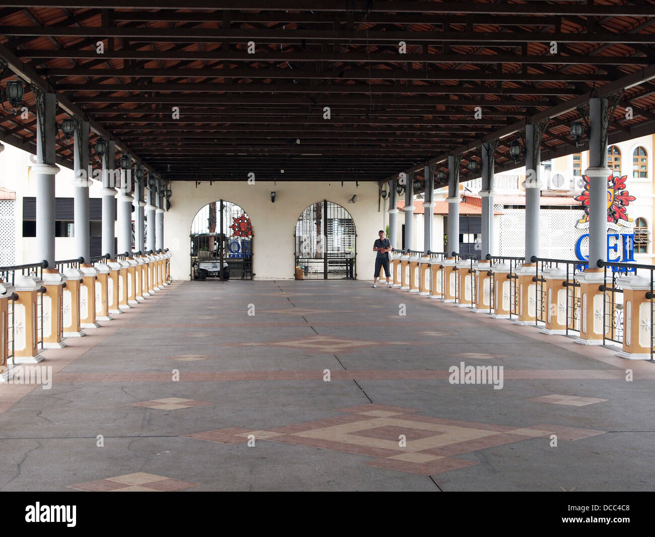 It's a photo of a covered platform or covered bridge near the sea or a ...