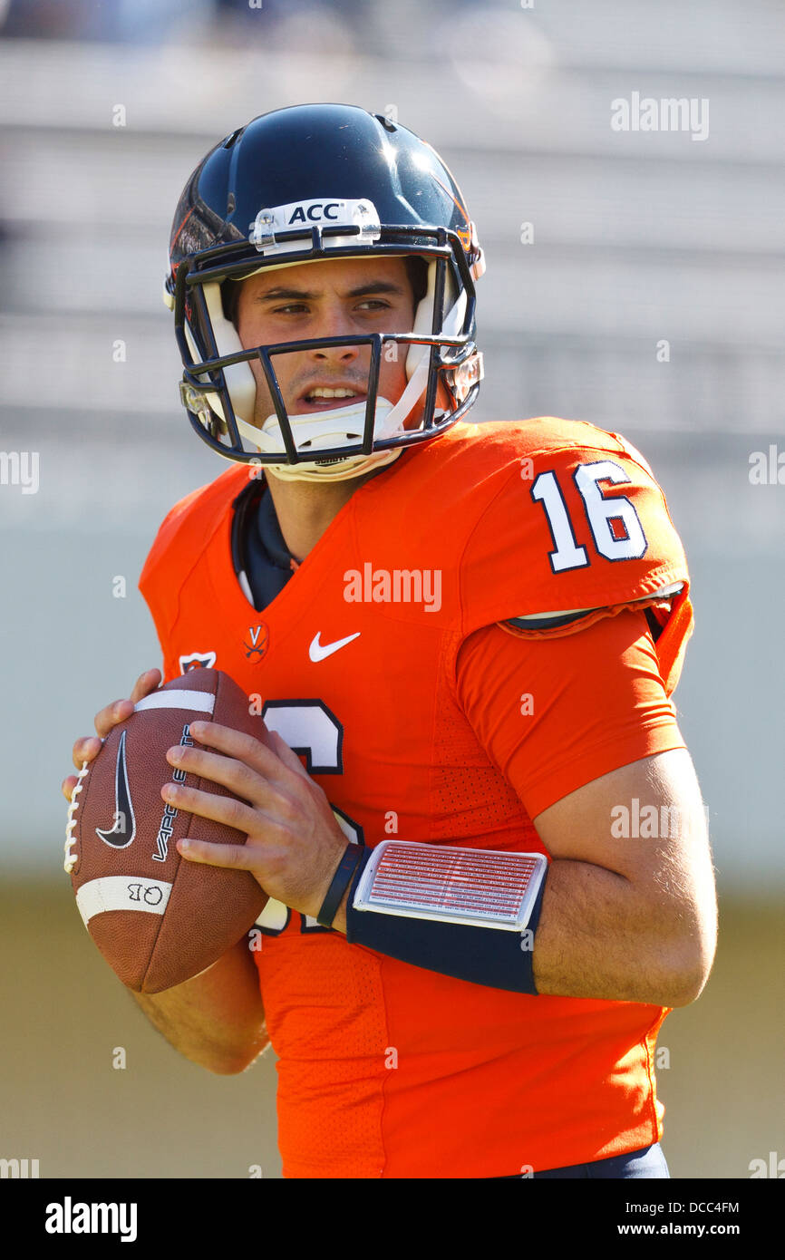 Virginia Cavaliers quarterback Michael Rocco (16) warms up before the ...