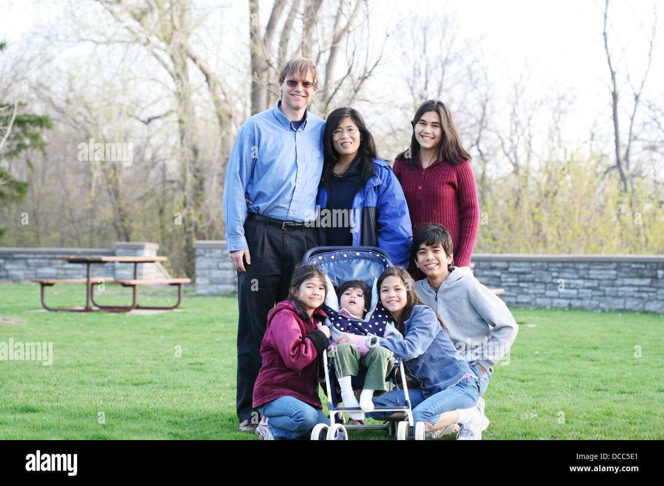 Interracial family of seven Stock Photo - Alamy
