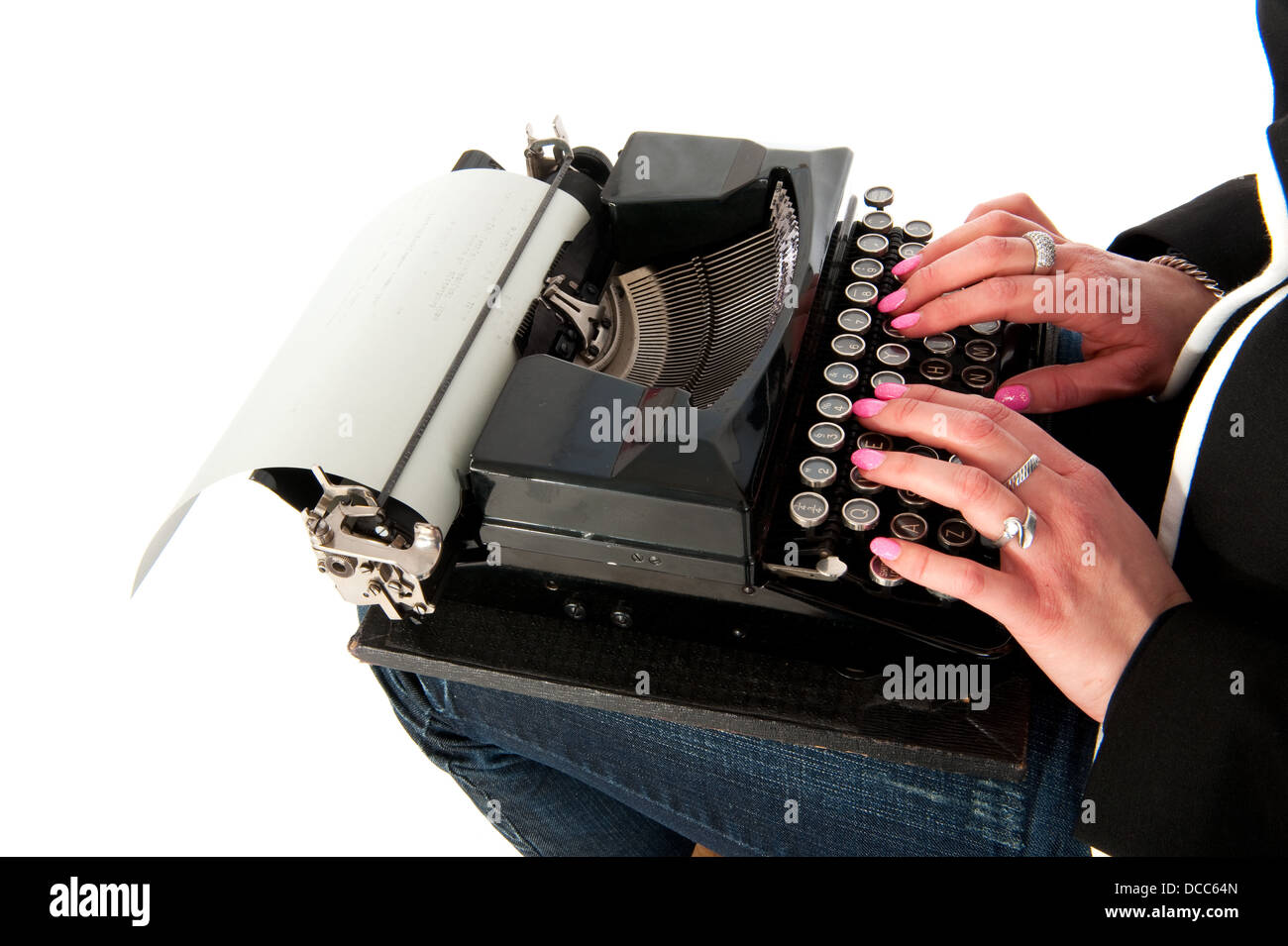 Girl with old typewriter Stock Photo - Alamy