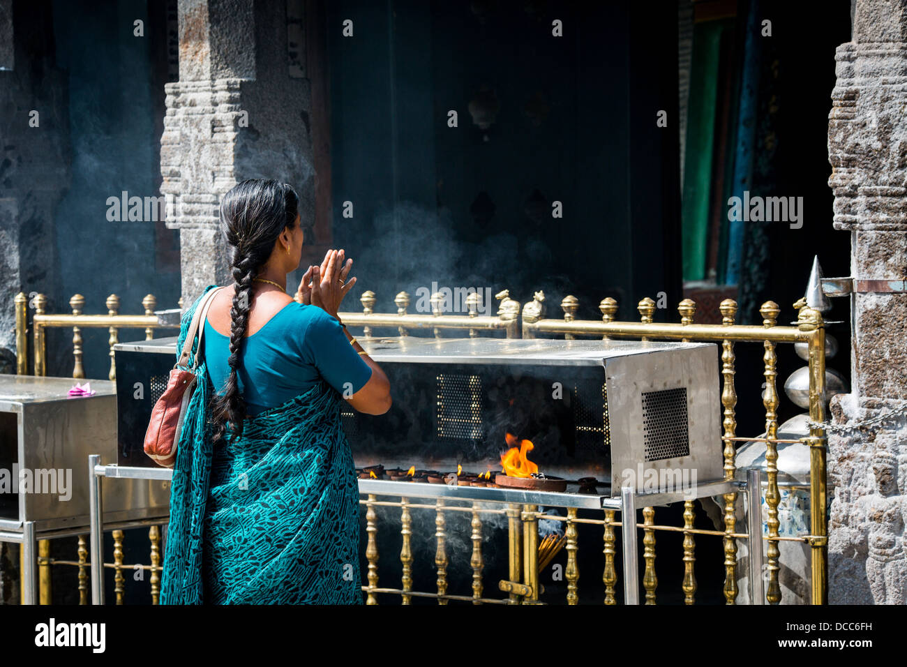 Hindu prayer in the ancient temple Stock Photo - Alamy