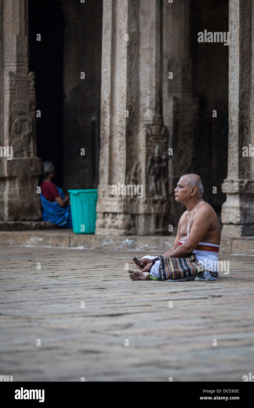Hindu prayer in the ancient temple Stock Photo - Alamy