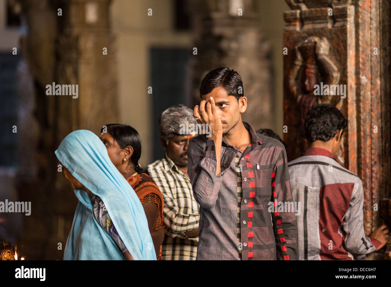Hindu prayer in the ancient temple Stock Photo - Alamy