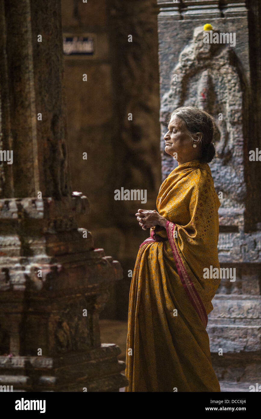 Hindu prayer in the ancient temple Stock Photo - Alamy