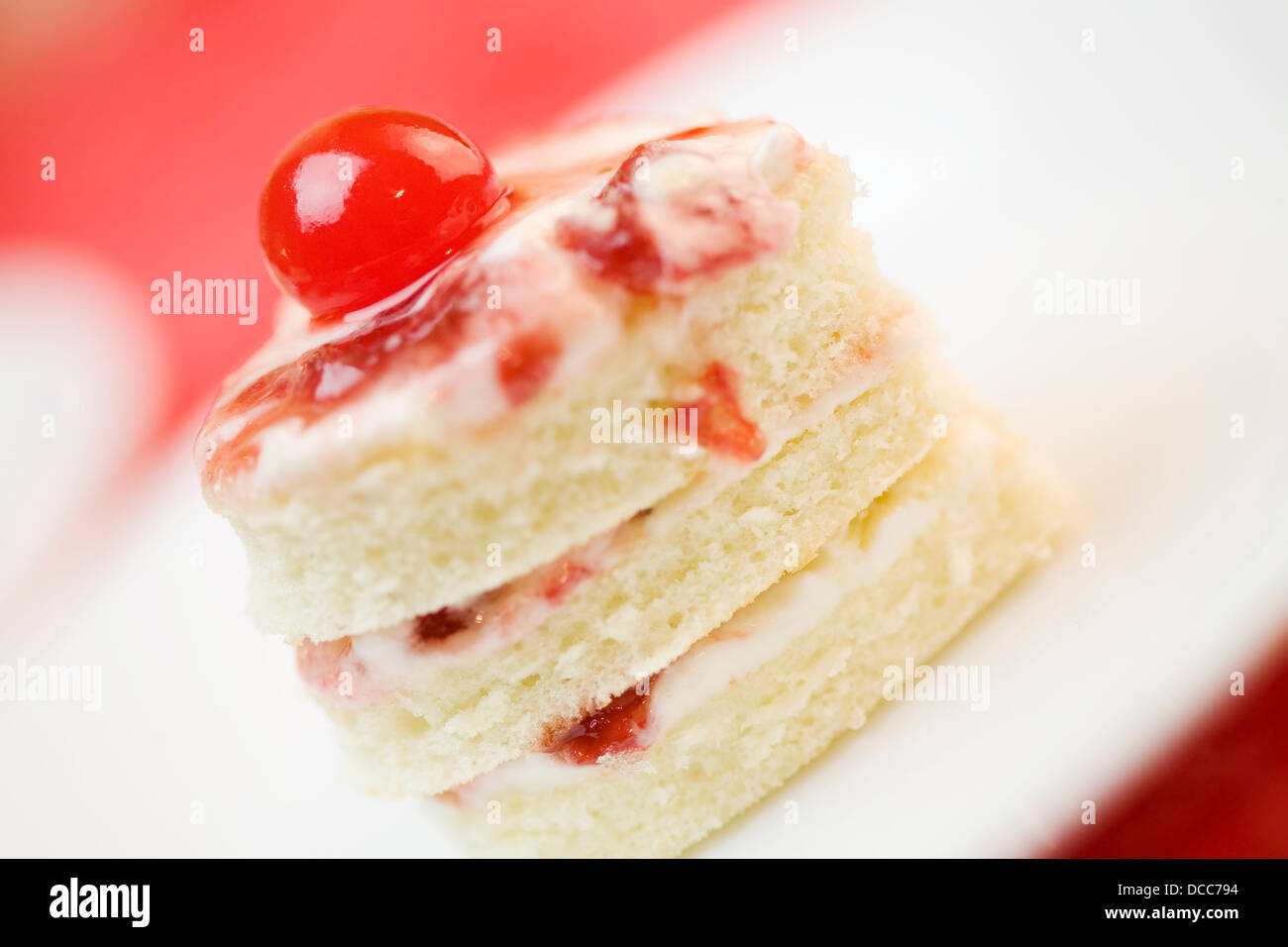 Three layer heart shape cake Stock Photo - Alamy