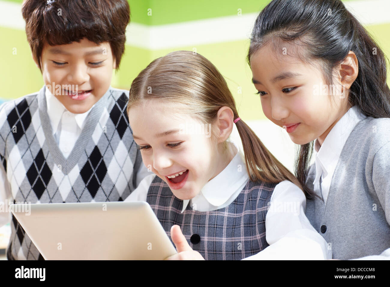 Boy laughing in a classroom hi-res stock photography and images - Alamy