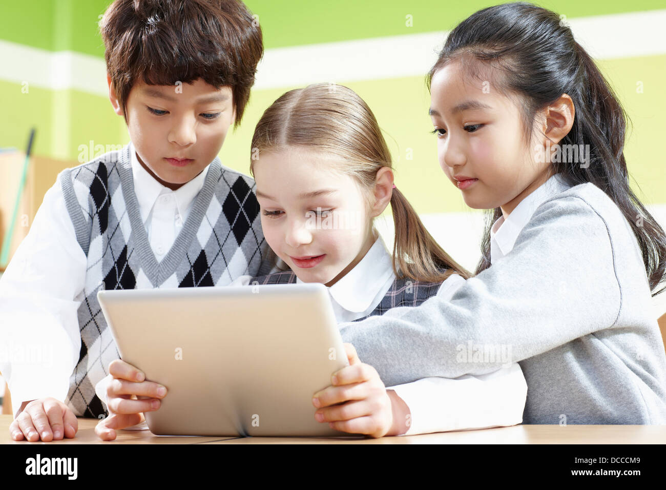 Boy laughing in a classroom hi-res stock photography and images - Alamy