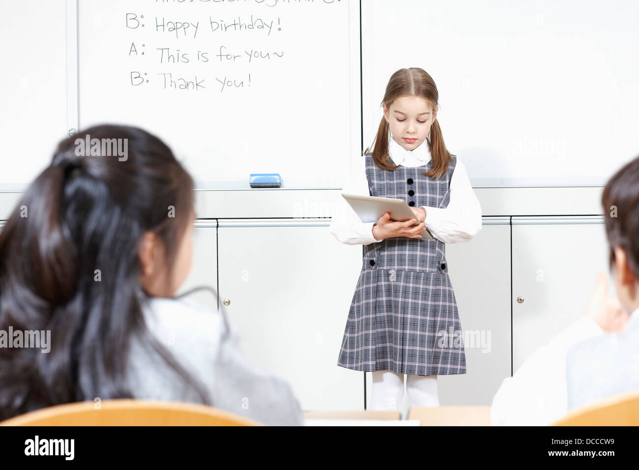 a student making a presentation in front of the class Stock Photo - Alamy