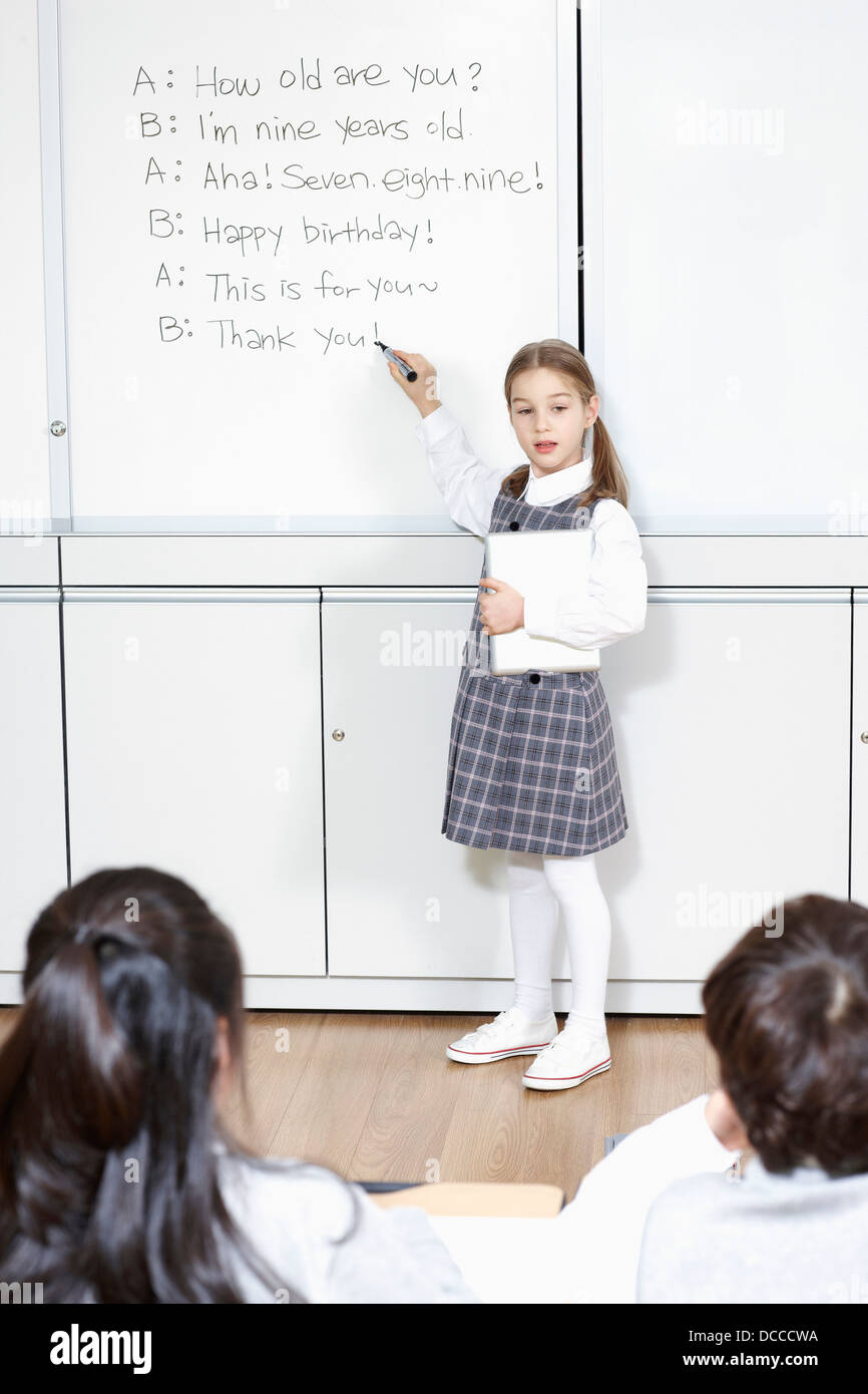 a student making a presentation in front of the class Stock Photo - Alamy