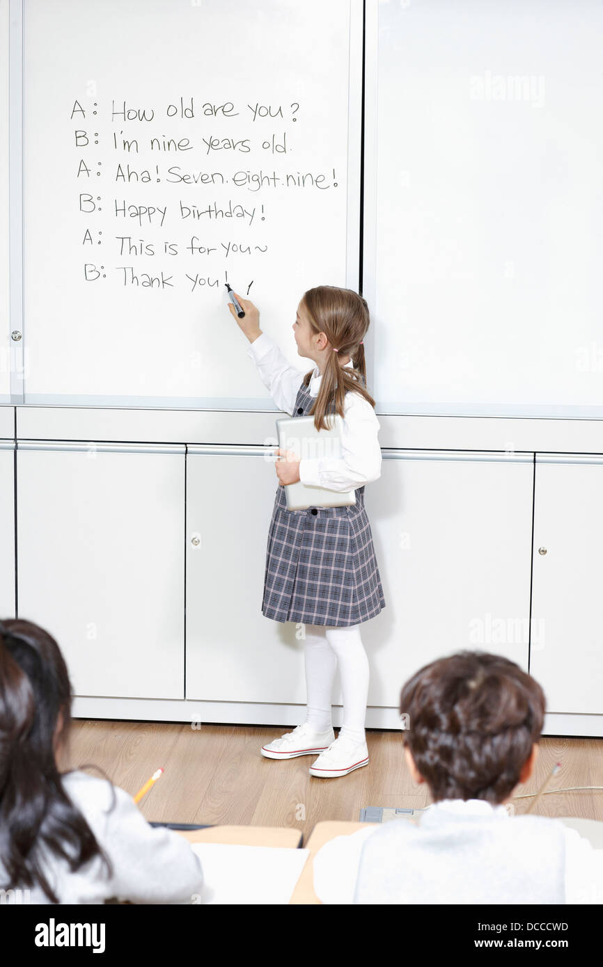 a student making a presentation in front of the class Stock Photo - Alamy