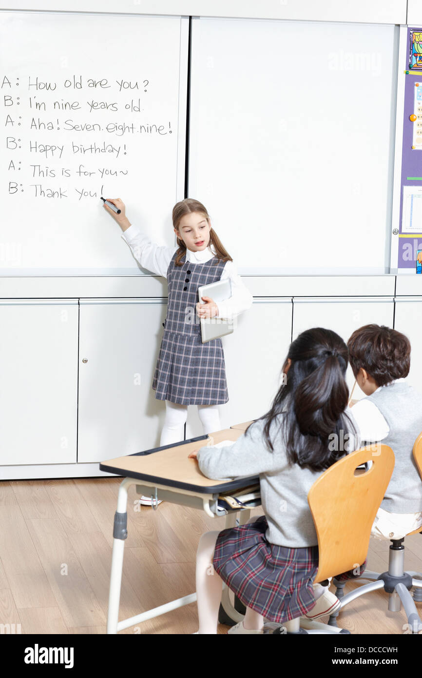a student making a presentation in front of the class Stock Photo - Alamy