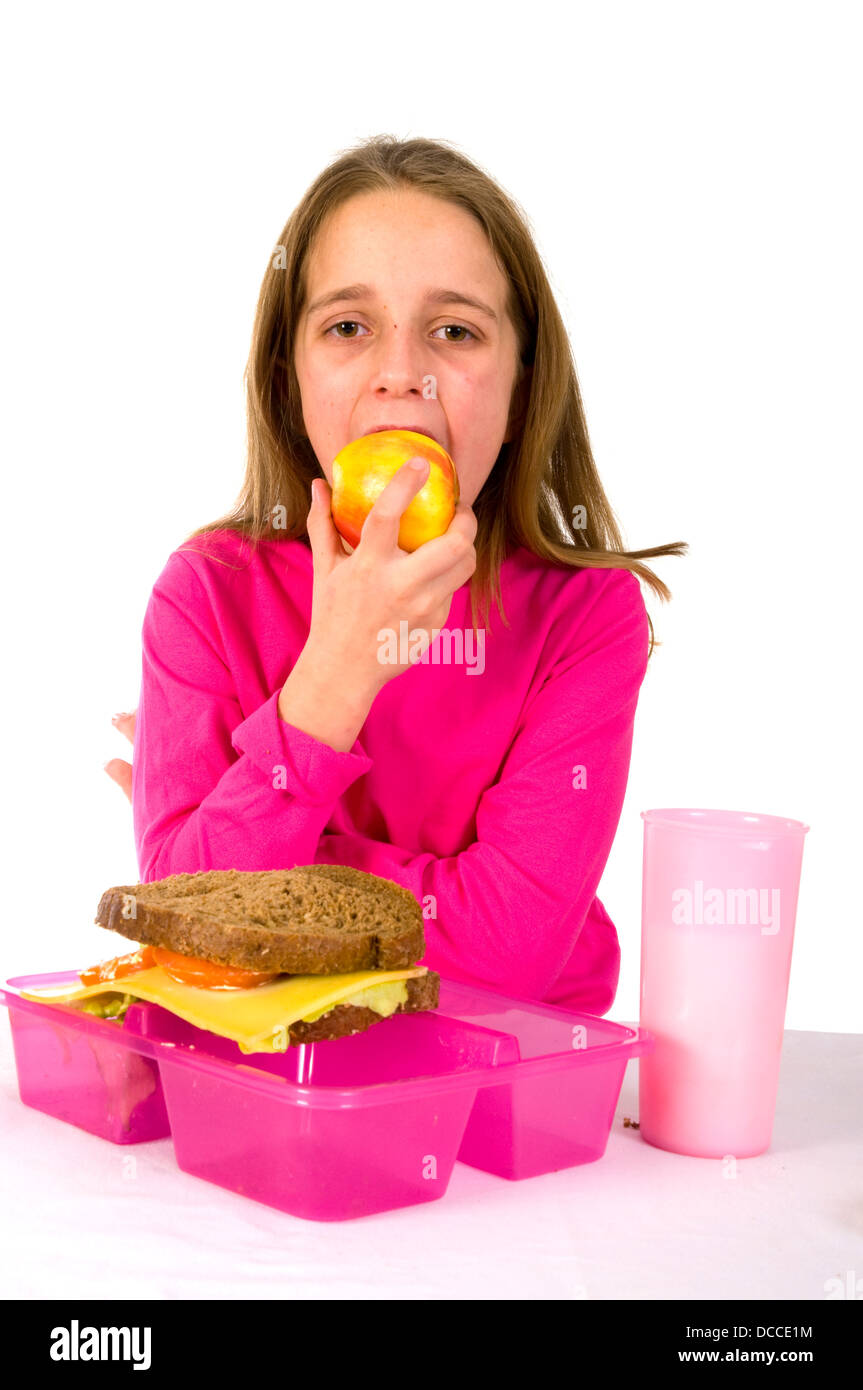 Little girl is having lunch Stock Photo - Alamy