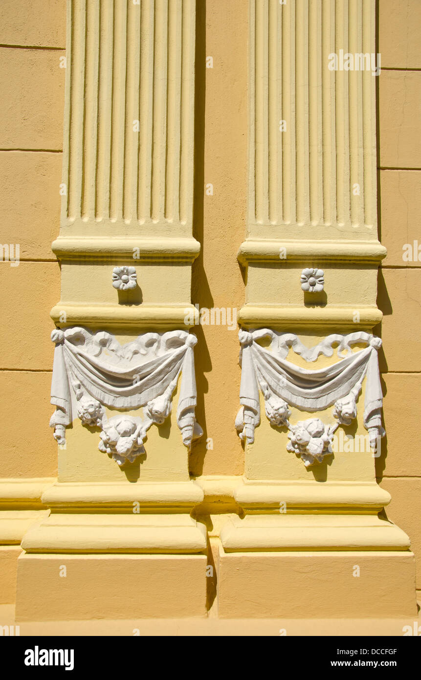 two decorative column on historical house wall Stock Photo - Alamy