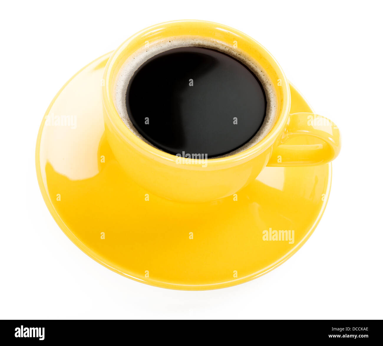 Coffee in an yellow cup Stock Photo - Alamy
