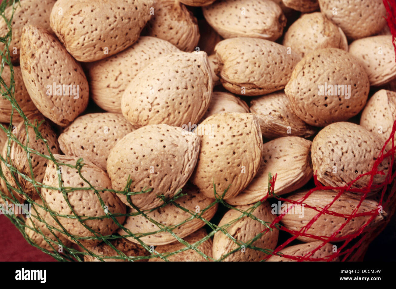 Almonds in shells Stock Photo - Alamy