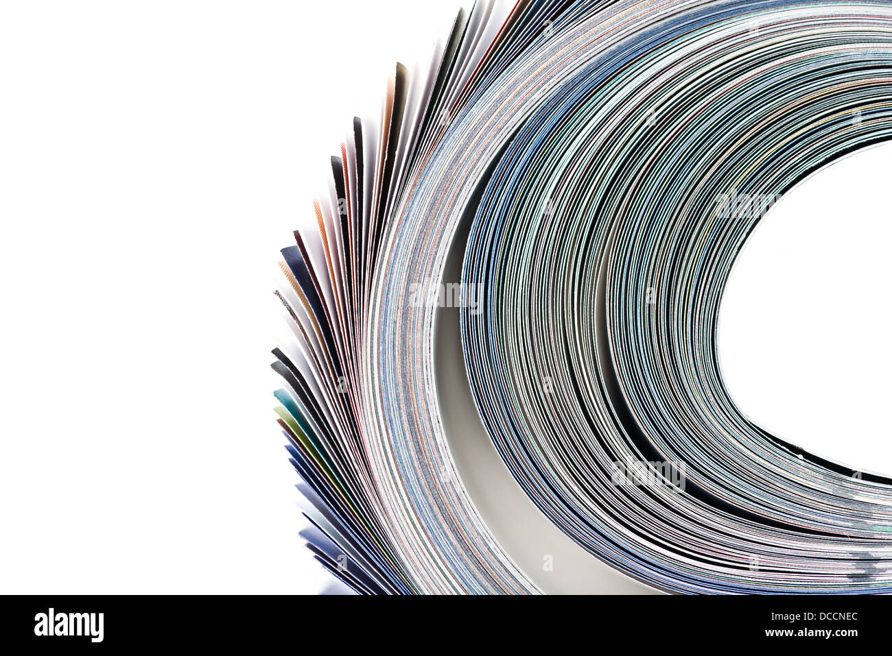 magazine roll on white background Stock Photo - Alamy
