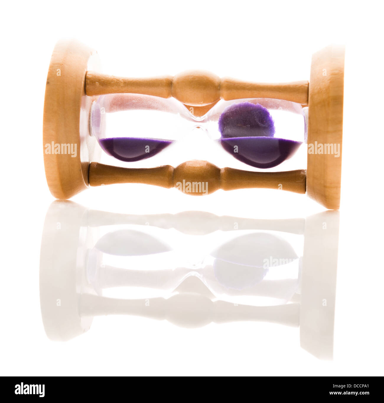 Hourglass with reflection on white background Stock Photo - Alamy