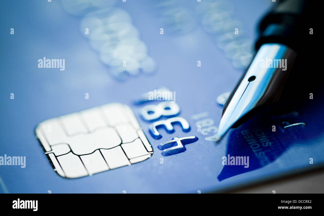 Credit card and pen Stock Photo - Alamy