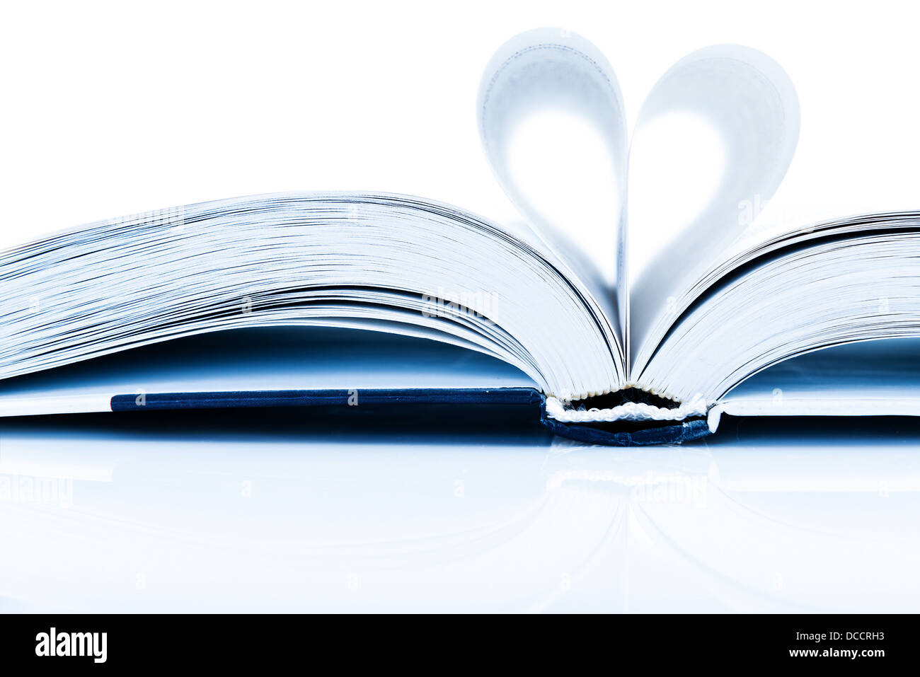 pages of a book curved into a heart shape Stock Photo - Alamy