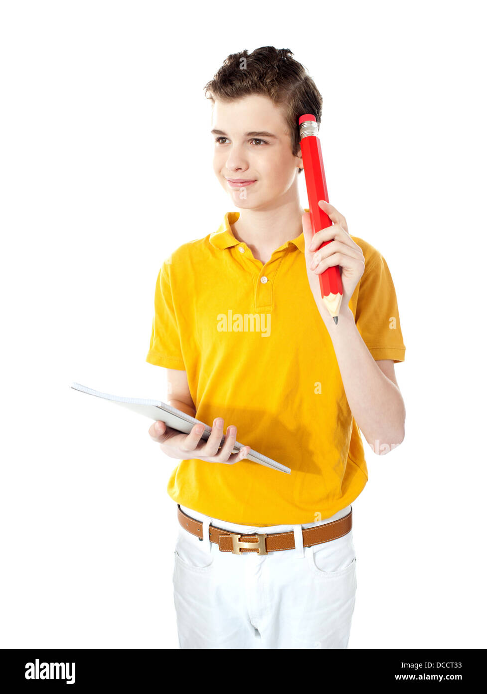 Young kid scratching his head with pencil Stock Photo - Alamy
