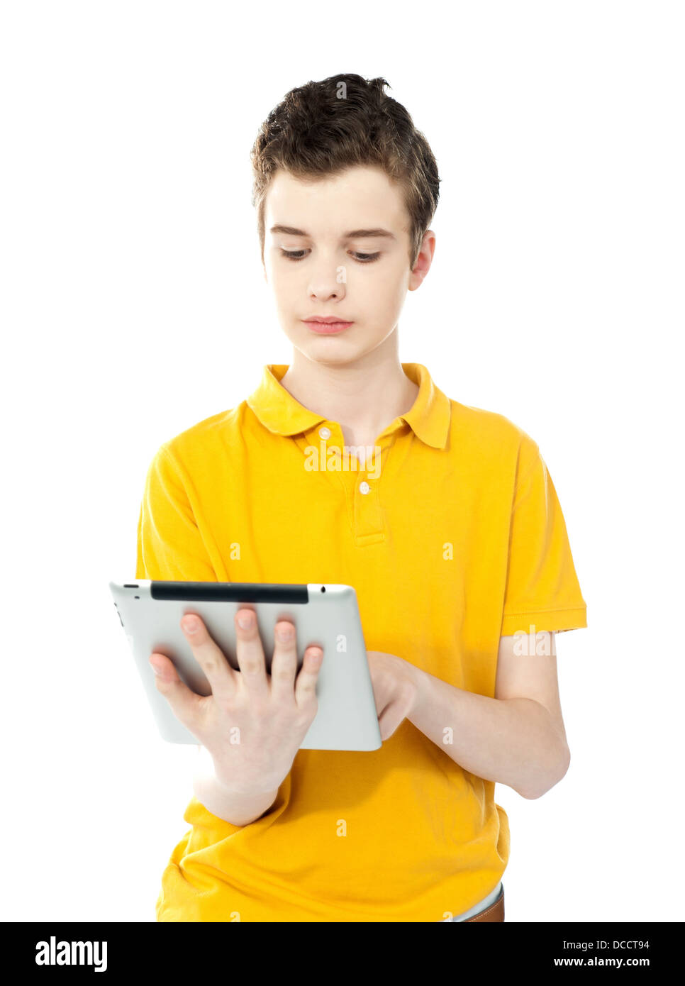 School kid working on his tablet pc, half length portrait Stock Photo ...