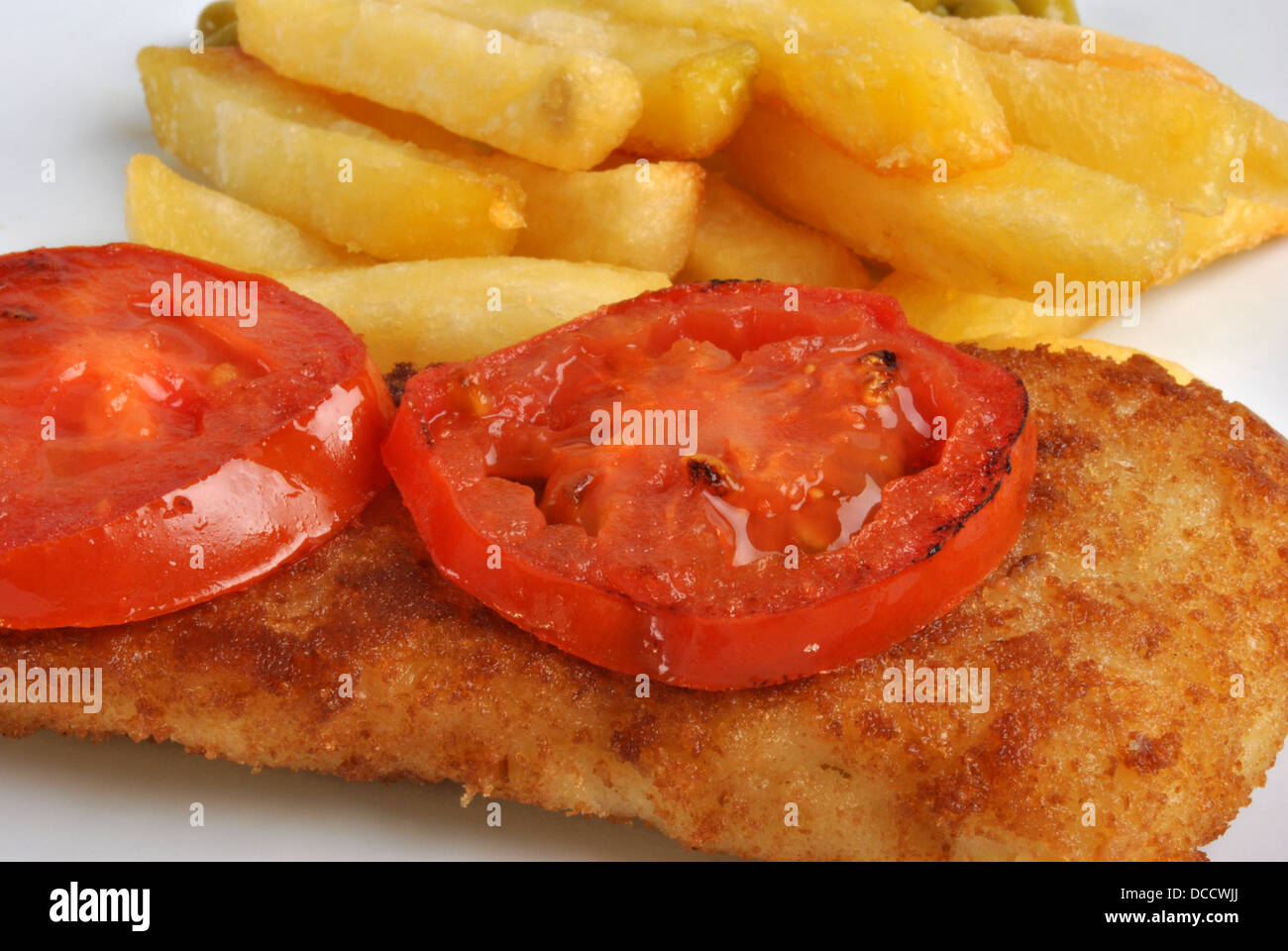 deep fried fish and some organic tomatoes Stock Photo - Alamy