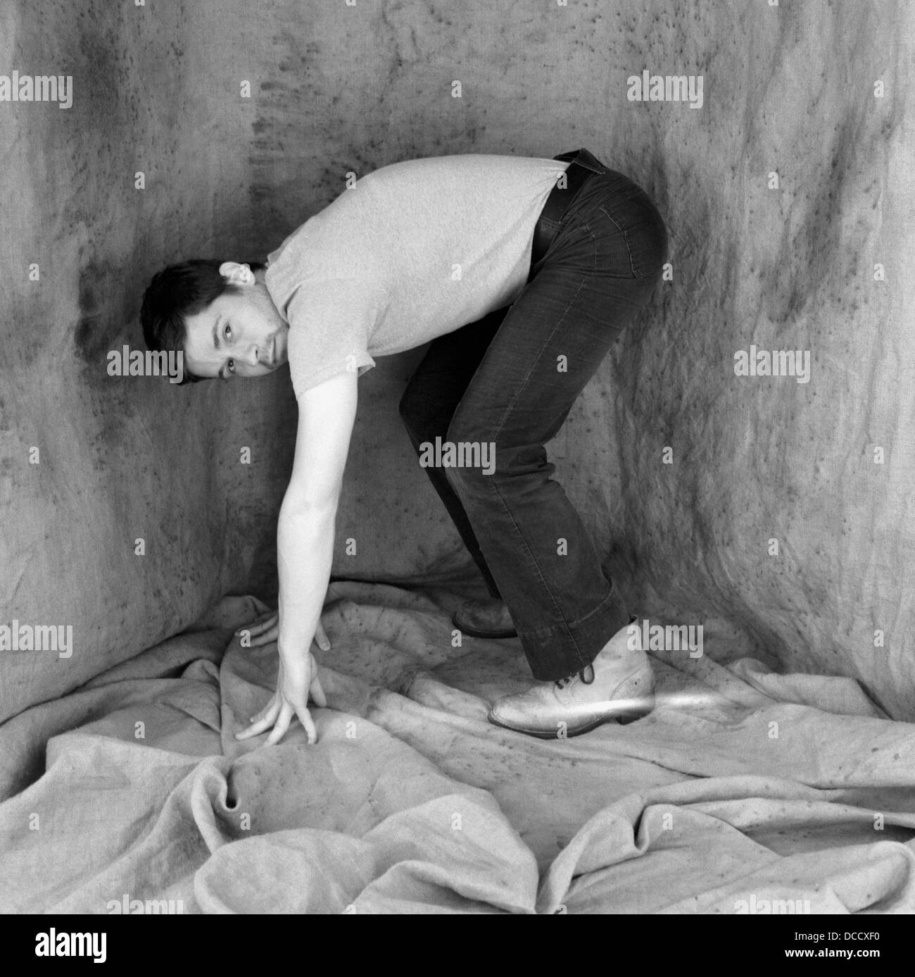 Difficult posture Black and White Stock Photos & Images - Alamy