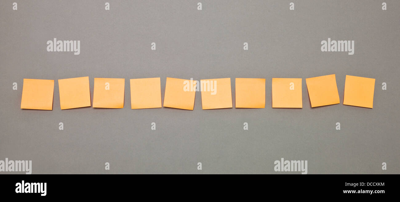 Adhesive Notes in a row Stock Photo - Alamy