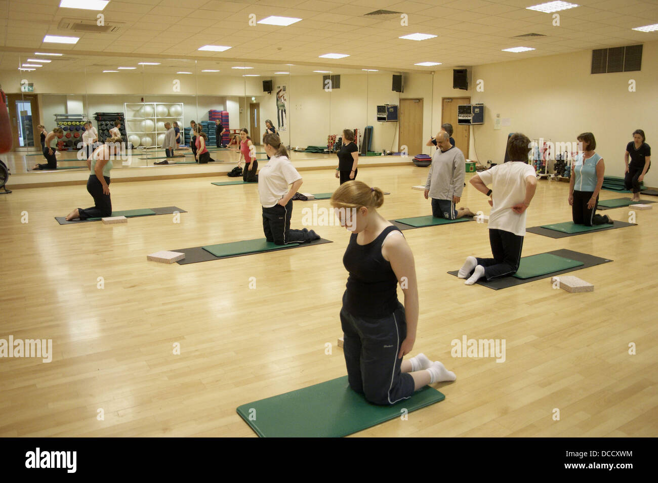 Kneeling people hi-res stock photography and images - Alamy