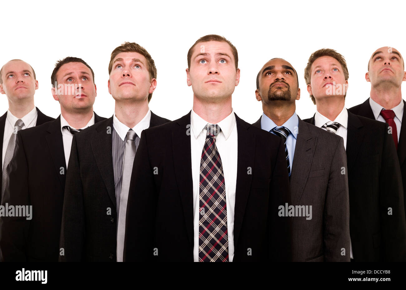 Confident team looking up Stock Photo - Alamy