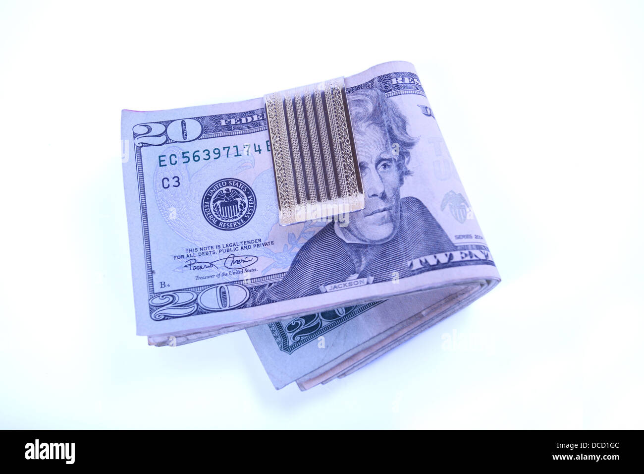 Dollar bills in money clip Stock Photo - Alamy