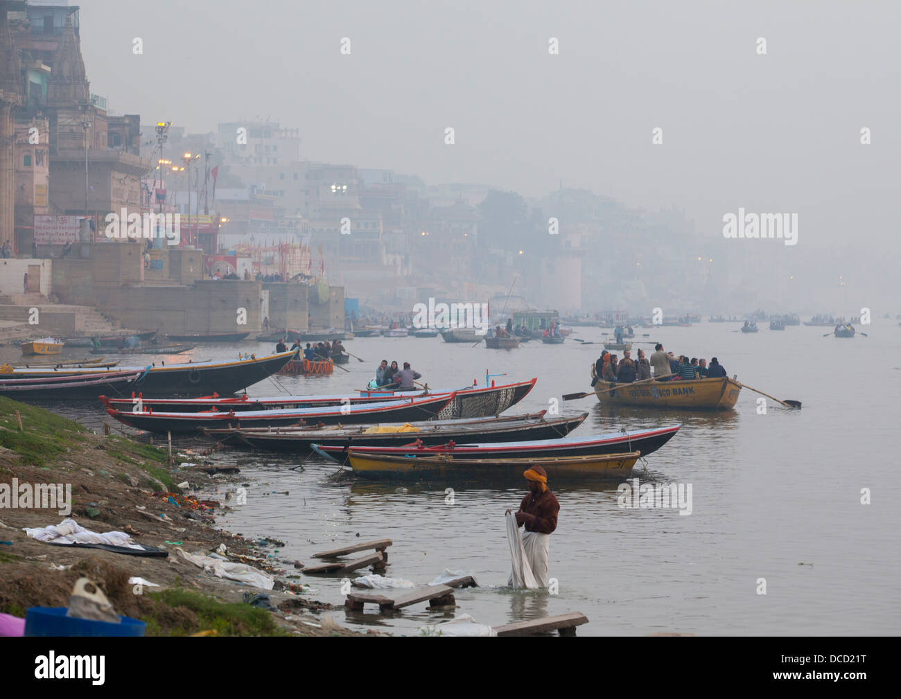 Boat floating in ganga river hi-res stock photography and images - Alamy