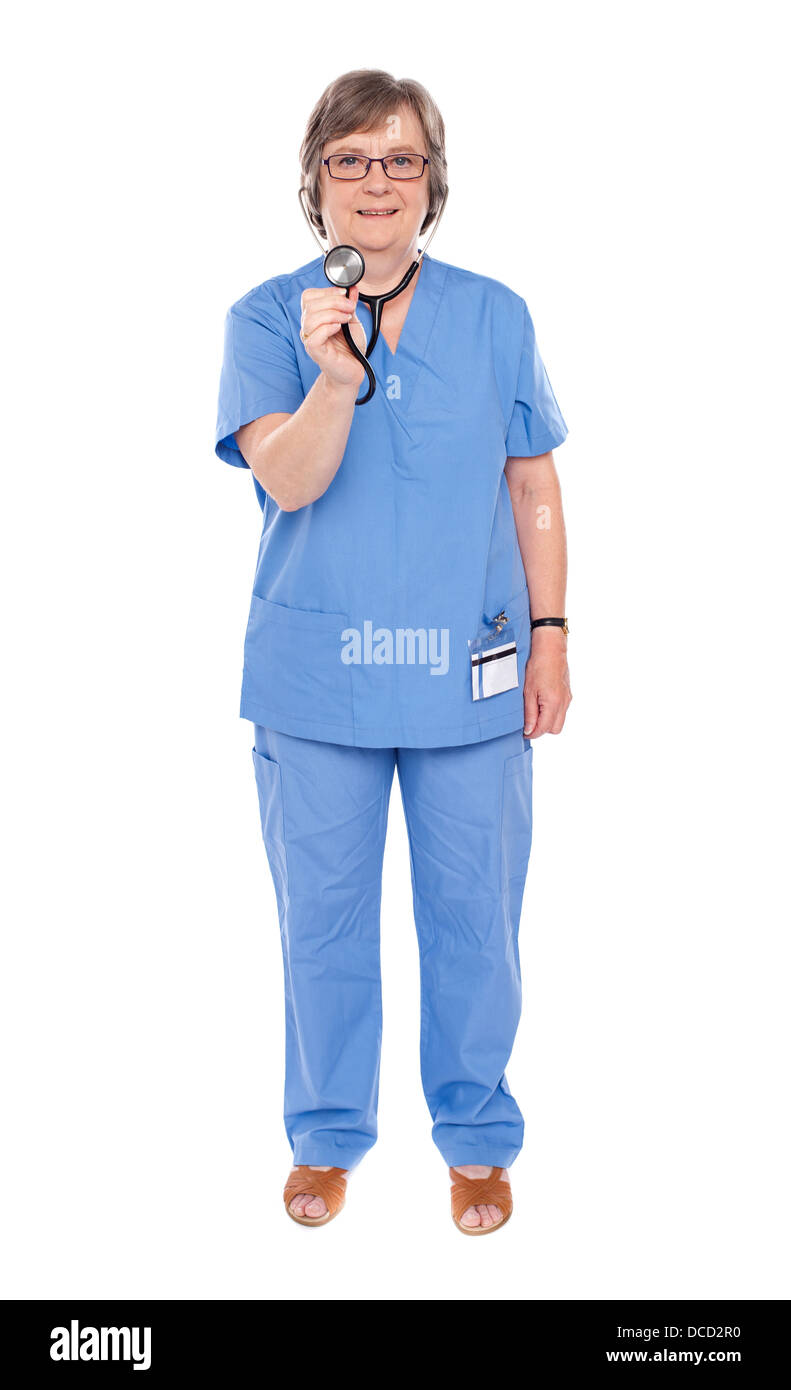 Full length portrait of senior lady doctor posing with stethoscope ...