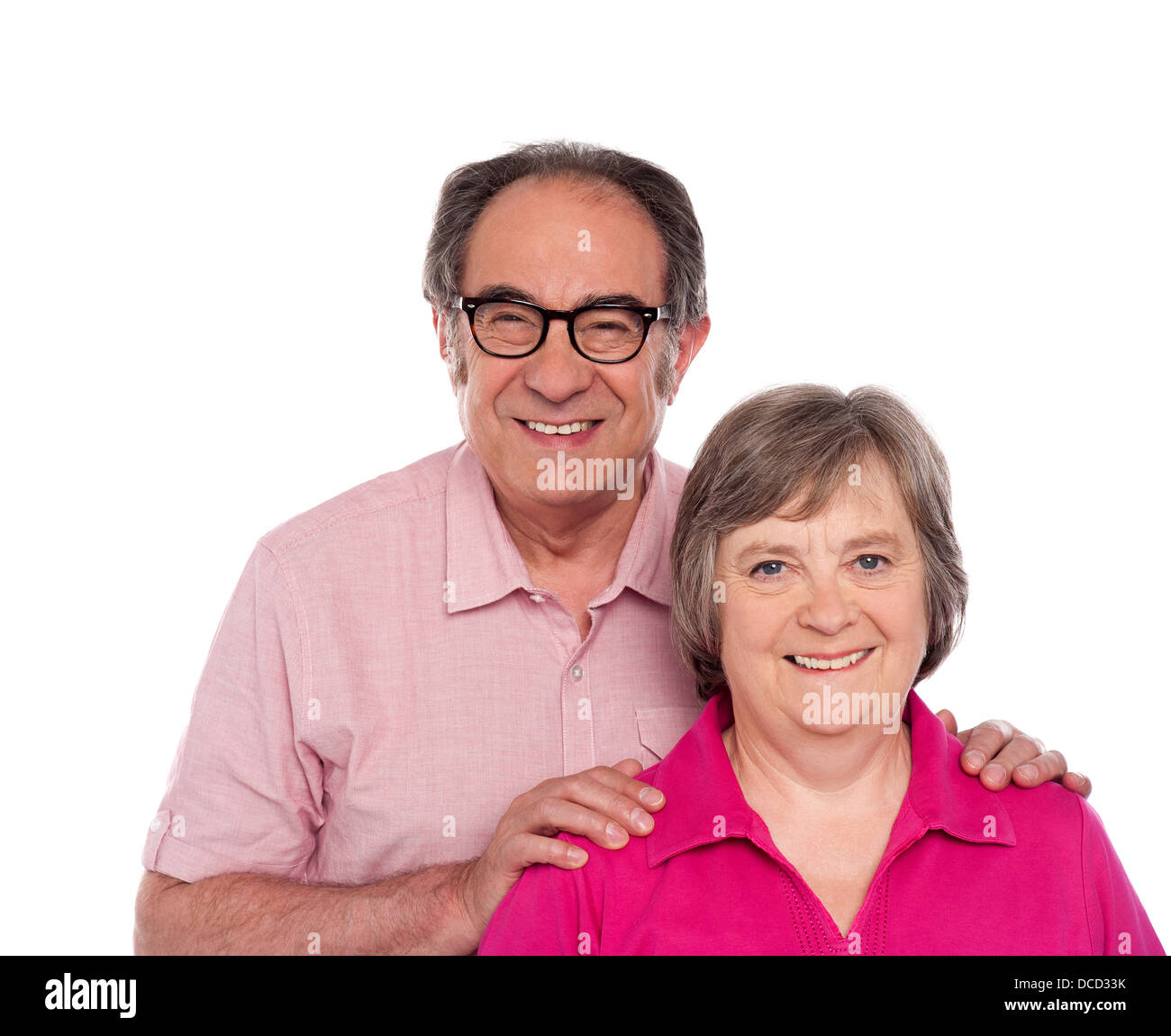 Happy senior love couple posing against white background Stock Photo ...