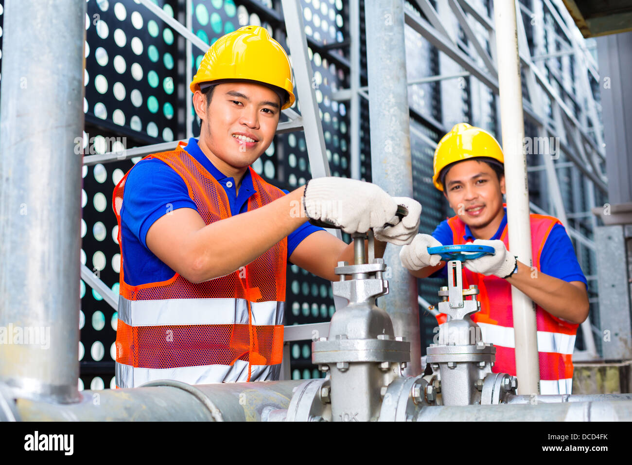 Technicians working industrial equipment hi-res stock photography and ...