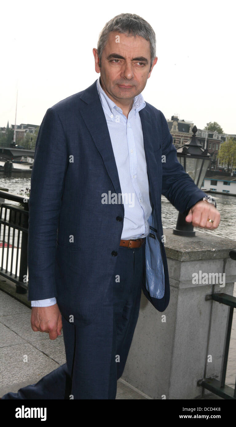 Rowan Atkinson poses for photographers during his promotional tour for ...