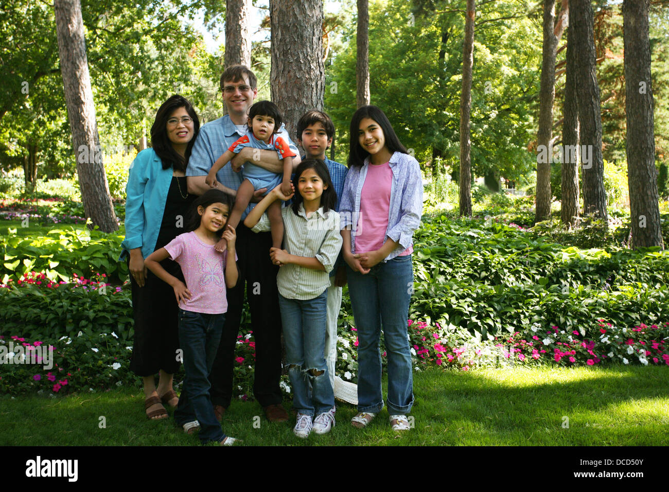 Large family of seven Stock Photo - Alamy