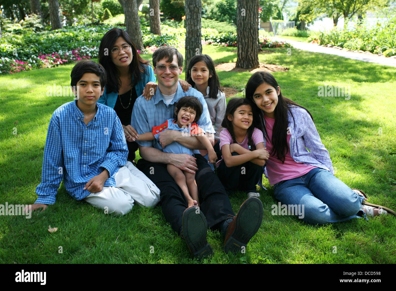 Large family of seven Stock Photo - Alamy