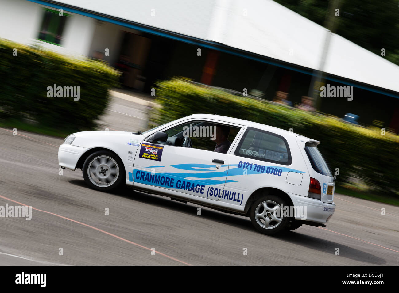A car taking part in an AutoSolo at Castle Combe Circuit Stock Photo ...