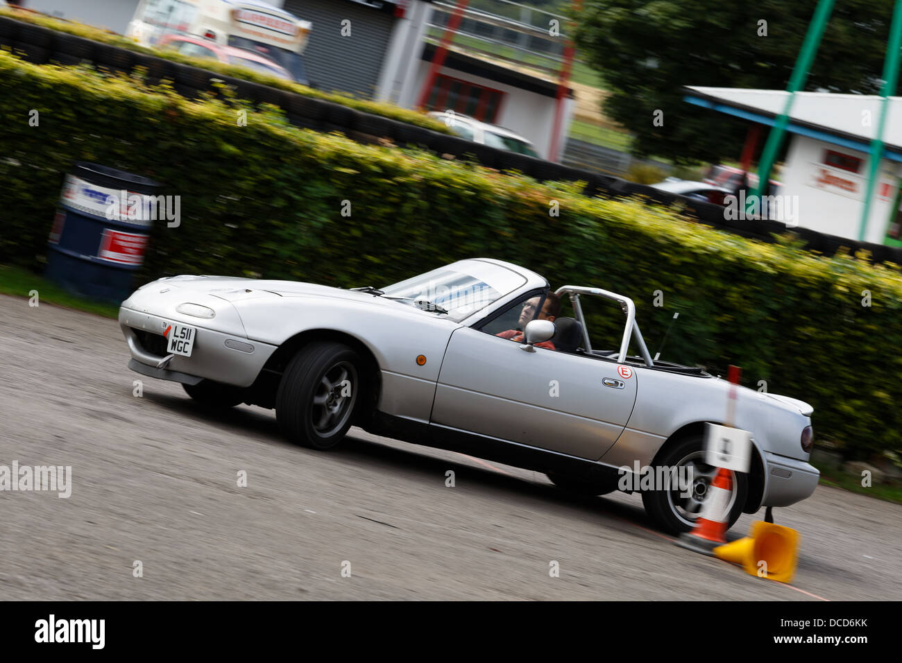 A car taking part in an AutoSolo at Castle Combe Circuit Stock Photo ...